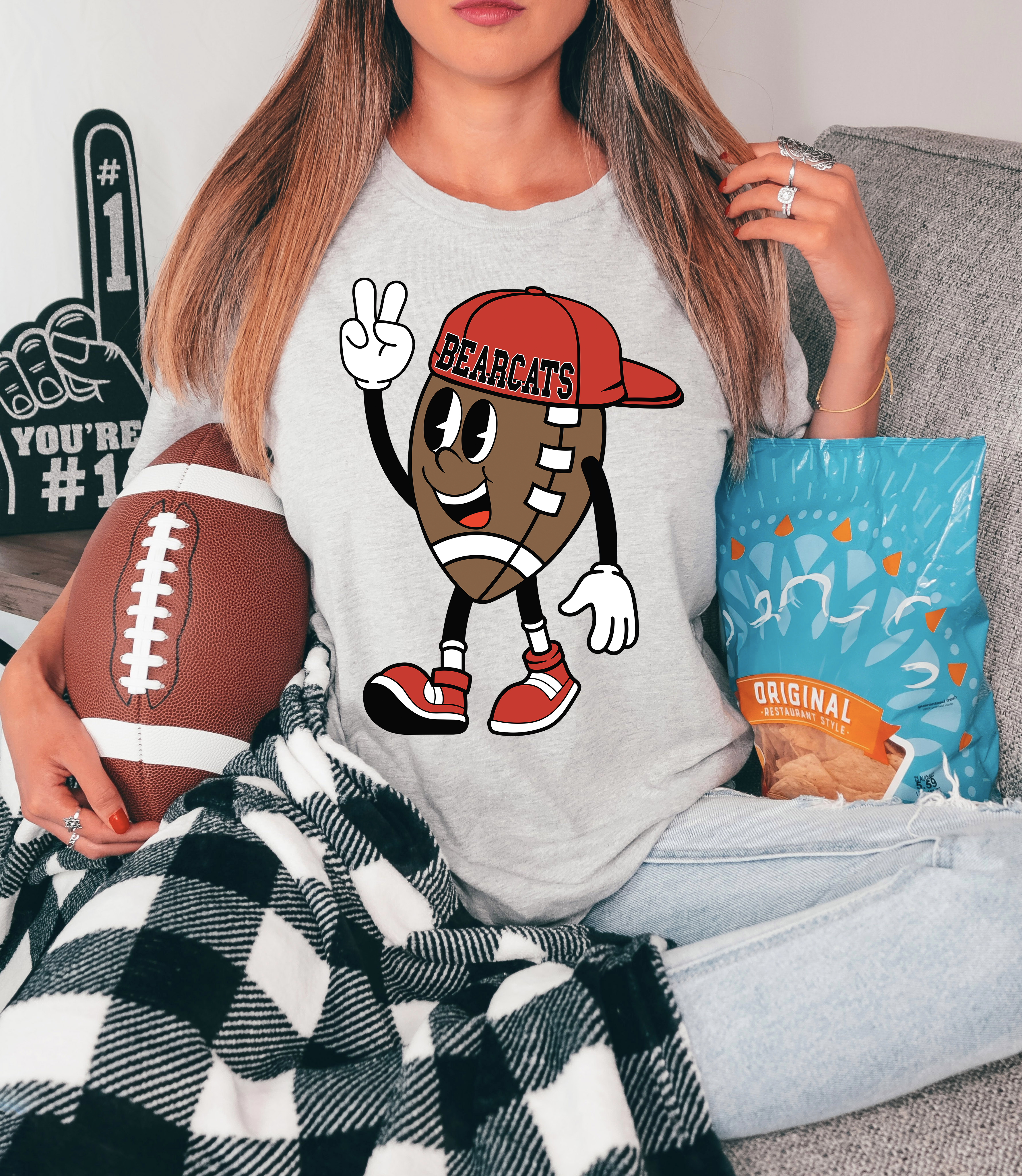 Bearcats Football Guy DTF Print – Torch Light